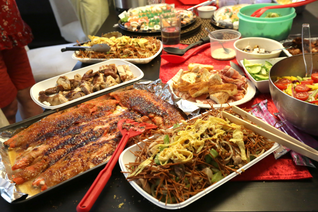 Hollister's Multicultural Office Potluck - The Hollister Group, Inc.